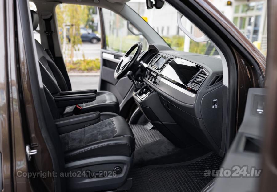 Brown Volkswagen Multivan 2016 in Tallinn, with an engine capacity of 2.00 L and mileage of 206 thousand km for 18790 €, photo 12 on AUTOMOTO.COM.LV