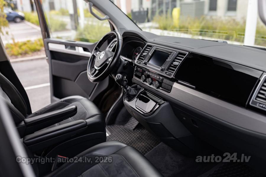 Brown Volkswagen Multivan 2016 in Tallinn, with an engine capacity of 2.00 L and mileage of 206 thousand km for 18790 €, photo 13 on AUTOMOTO.COM.LV