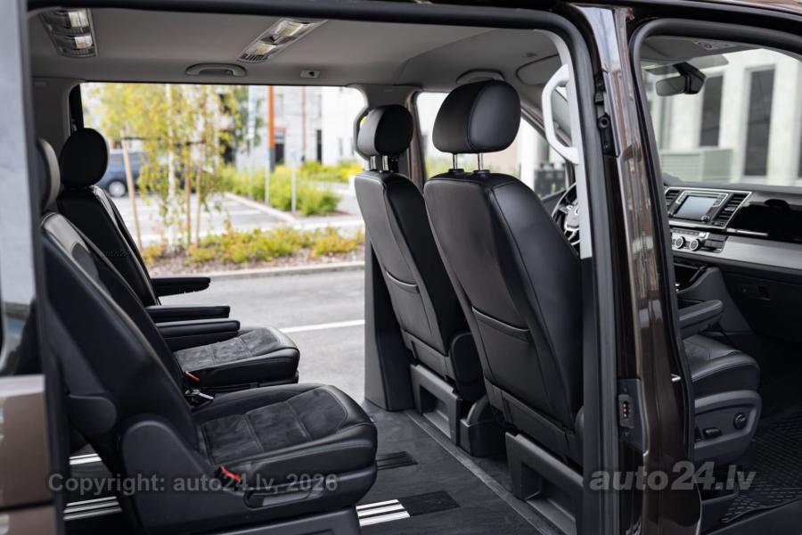 Brown Volkswagen Multivan 2016 in Tallinn, with an engine capacity of 2.00 L and mileage of 206 thousand km for 18790 €, photo 14 on AUTOMOTO.COM.LV