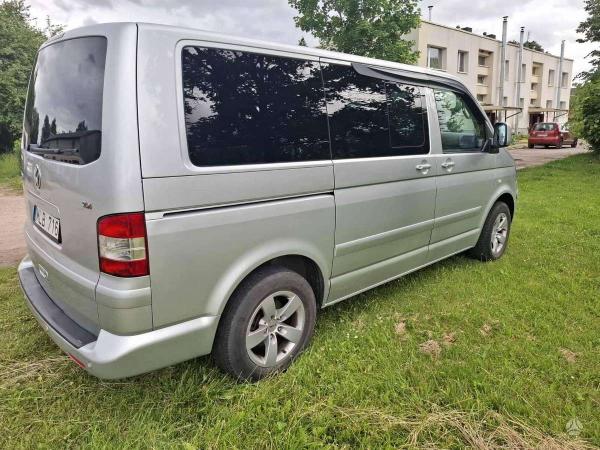 Grey Volkswagen Multivan 2007 in Ignalina, with an engine capacity of 2.46 L and mileage of 340 thousand km for 7500 €, photo 3 on AUTOMOTO.COM.LV