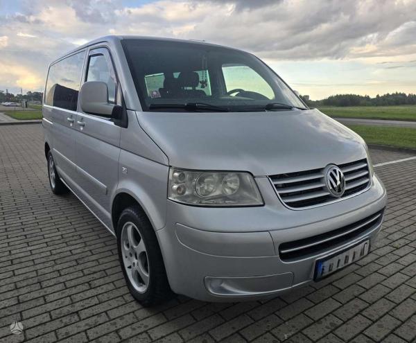 Pelēks Volkswagen Multivan 2008 Panevēža, ar dzinēja tilpumu 1.90 L un nobraukumu 328 tūkst. km par 10499 €, foto 7 vietnē AUTOMOTO.COM.LV