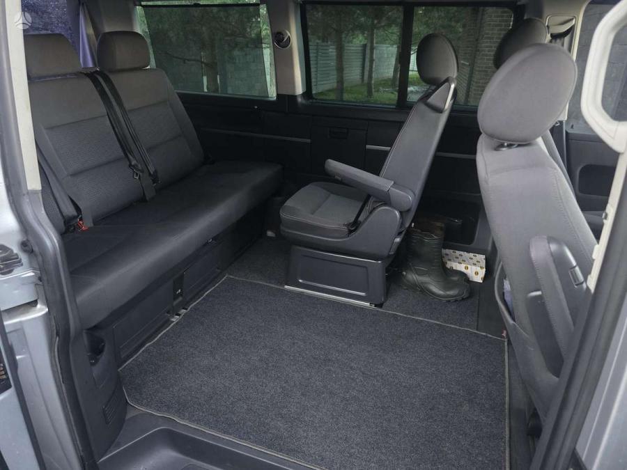 Grey Volkswagen Multivan 2008 in Panevezys, with an engine capacity of 1.90 L and mileage of 328 thousand km for 10499 €, photo 15 on AUTOMOTO.COM.LV