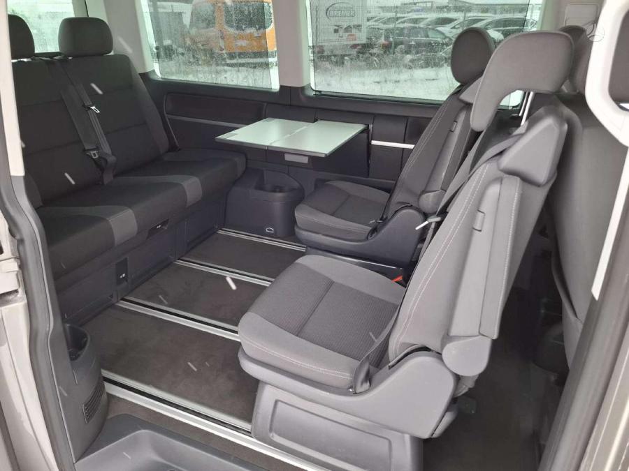Grey Volkswagen Multivan 2011 in Marijampole, with an engine capacity of 2.00 L and mileage of 257 thousand km for 14200 €, photo 13 on AUTOMOTO.COM.LV
