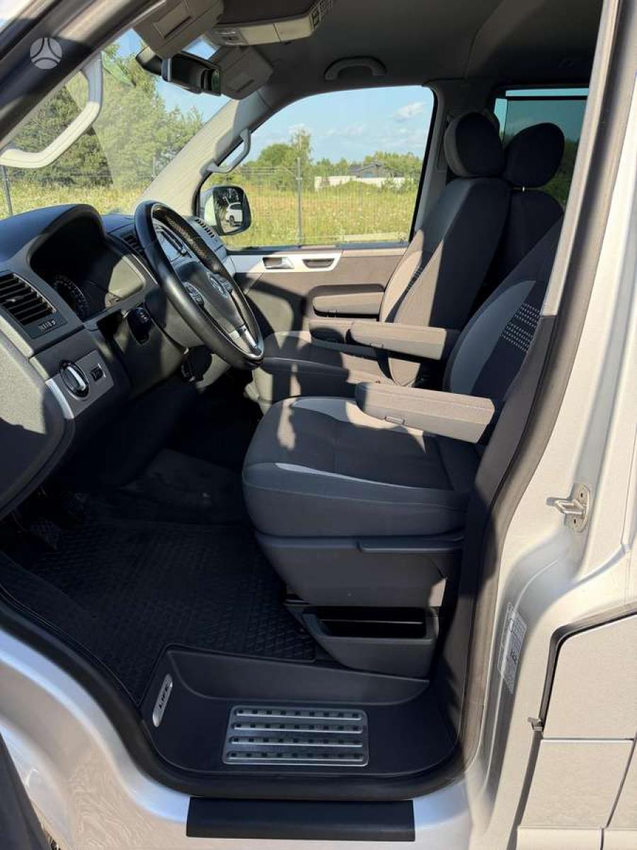 Grey Volkswagen Multivan 2013 in Vilnius, with an engine capacity of 1.97 L and mileage of 267 thousand km for 13950 €, photo 12 on AUTOMOTO.COM.LV