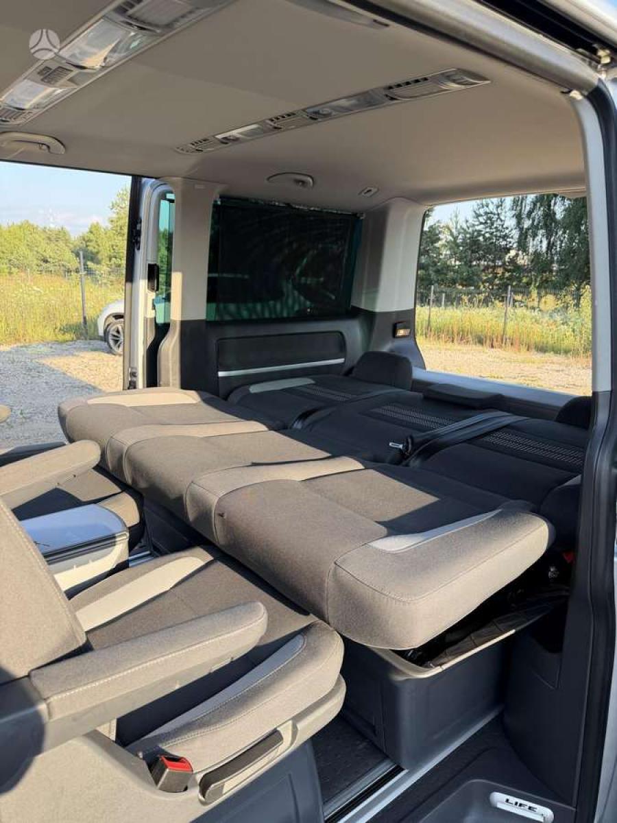 Grey Volkswagen Multivan 2013 in Vilnius, with an engine capacity of 1.97 L and mileage of 267 thousand km for 13950 €, photo 37 on AUTOMOTO.COM.LV