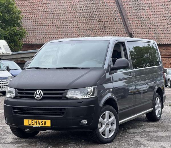 Grey Volkswagen Multivan 2013 in Klaipeda, with an engine capacity of 1.97 L and mileage of 124 thousand km for 24999 €, photo 1 on AUTOMOTO.COM.LV