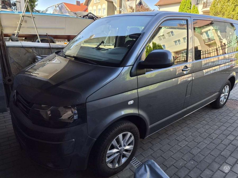 Grey Volkswagen Multivan 2015 in Jonava, with an engine capacity of 2.00 L and mileage of 274 thousand km for 16100 €, photo 1 on AUTOMOTO.COM.LV