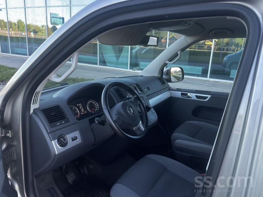 Grey Volkswagen Multivan 2011 in Rezekne, with an engine capacity of 2.00 L and mileage of 258 thousand km for 16900 €, photo 17 on AUTOMOTO.COM.LV
