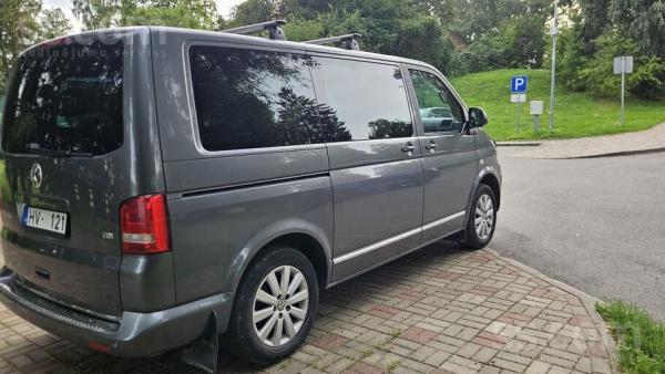 Grey Volkswagen Multivan 2011 in Riga, with an engine capacity of 2.00 L and mileage of 174 thousand km for 18690 €, photo 3 on AUTOMOTO.COM.LV