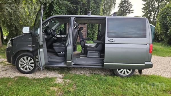 Grey Volkswagen Multivan 2011 in Riga, with an engine capacity of 2.00 L and mileage of 174 thousand km for 18690 €, photo 10 on AUTOMOTO.COM.LV