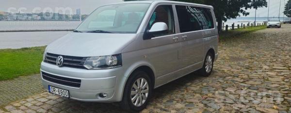 Grey Volkswagen Multivan 2011 in Riga, with an engine capacity of 2.00 L and mileage of 393 thousand km for 14300 €, photo 3 on AUTOMOTO.COM.LV