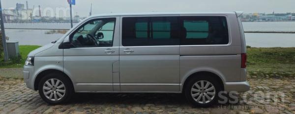 Grey Volkswagen Multivan 2011 in Riga, with an engine capacity of 2.00 L and mileage of 393 thousand km for 14300 €, photo 4 on AUTOMOTO.COM.LV