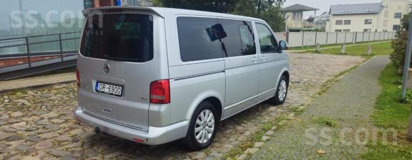Grey Volkswagen Multivan 2011 in Riga, with an engine capacity of 2.00 L and mileage of 393 thousand km for 14300 €, photo 6 on AUTOMOTO.COM.LV