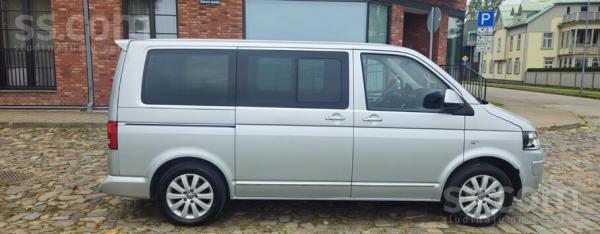 Grey Volkswagen Multivan 2011 in Riga, with an engine capacity of 2.00 L and mileage of 393 thousand km for 14300 €, photo 7 on AUTOMOTO.COM.LV