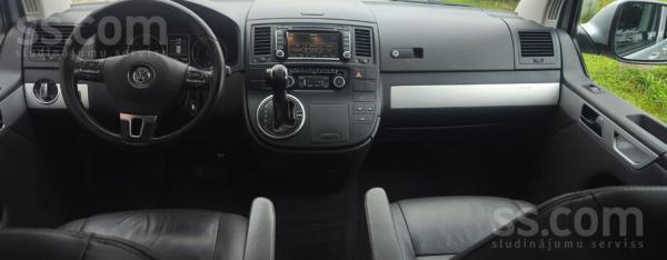 Grey Volkswagen Multivan 2011 in Riga, with an engine capacity of 2.00 L and mileage of 393 thousand km for 14300 €, photo 11 on AUTOMOTO.COM.LV