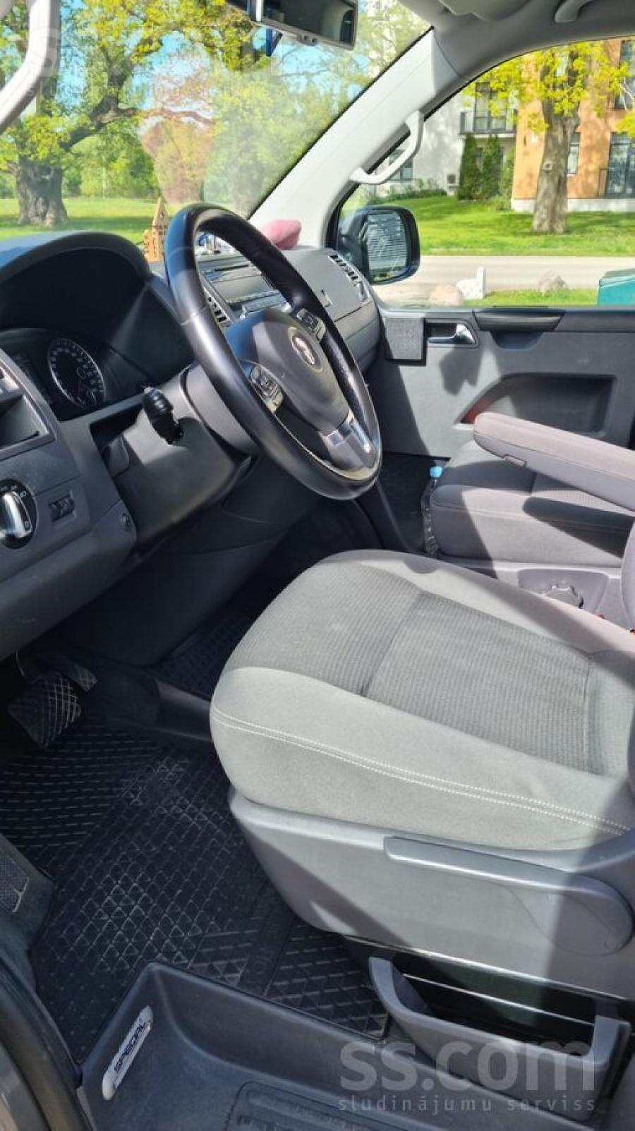 Grey Volkswagen Multivan 2014 in Riga, with an engine capacity of 2.00 L and mileage of 334 thousand km for 18000 €, photo 7 on AUTOMOTO.COM.LV