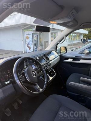 Grey Volkswagen Multivan 2016 in Riga, with an engine capacity of 2.00 L and mileage of 233 thousand km for 19900 €, photo 7 on AUTOMOTO.COM.LV
