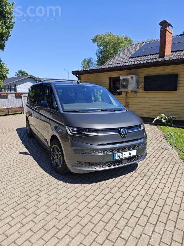 Grey Volkswagen Multivan 2023 in Liepaja, with an engine capacity of 2.00 L and mileage of 94 thousand km for 53900 €, photo 2 on AUTOMOTO.COM.LV