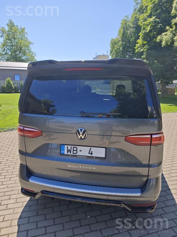 Grey Volkswagen Multivan 2023 in Liepaja, with an engine capacity of 2.00 L and mileage of 94 thousand km for 53900 €, photo 3 on AUTOMOTO.COM.LV