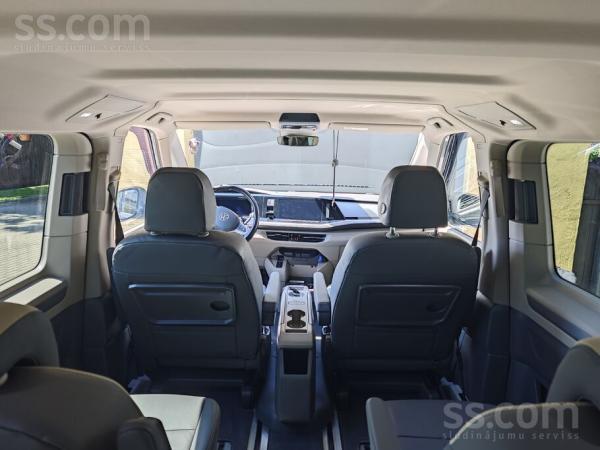 Grey Volkswagen Multivan 2023 in Liepaja, with an engine capacity of 2.00 L and mileage of 94 thousand km for 53900 €, photo 4 on AUTOMOTO.COM.LV