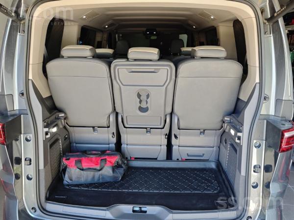 Grey Volkswagen Multivan 2023 in Liepaja, with an engine capacity of 2.00 L and mileage of 94 thousand km for 53900 €, photo 6 on AUTOMOTO.COM.LV