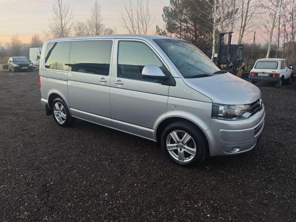 Grey Volkswagen Multivan 2010 in Kretinga, with an engine capacity of 1.97 L and mileage of 450 thousand km for 11750 €, photo 5 on AUTOMOTO.COM.LV