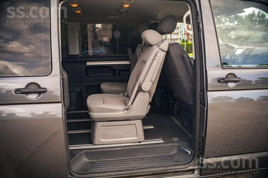 Grey Volkswagen Multivan 2010 in Riga, with an engine capacity of 2.00 L and mileage of 0 thousand km for 9990 €, photo 12 on AUTOMOTO.COM.LV