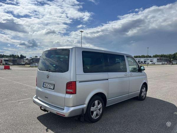 Grey Volkswagen Multivan 2014 in Vilnius, with an engine capacity of 2.00 L and mileage of 260 thousand km for 19300 €, photo 4 on AUTOMOTO.COM.LV
