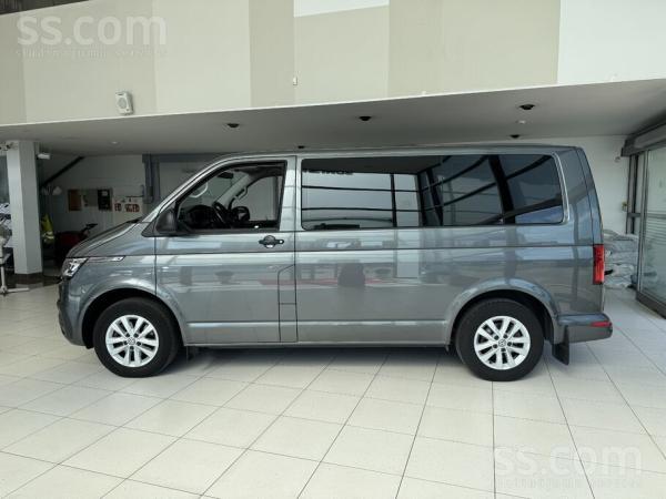 Grey Volkswagen Multivan 2021 in Riga, with an engine capacity of 2.00 L and mileage of 91 thousand km for 31900 €, photo 2 on AUTOMOTO.COM.LV