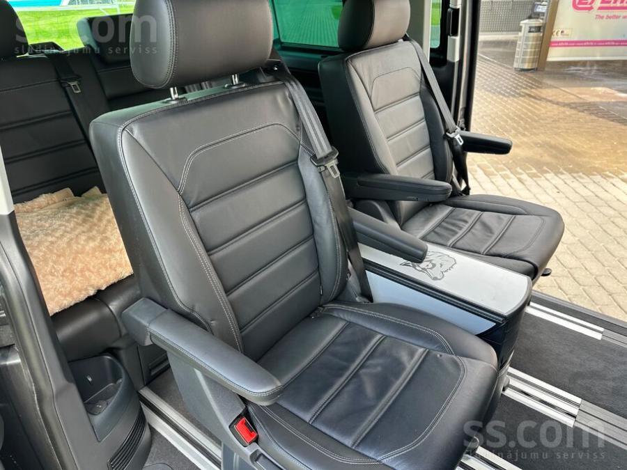 Grey Volkswagen Multivan 2023 in Riga, with an engine capacity of 2.00 L and mileage of 93 thousand km for 44900 €, photo 8 on AUTOMOTO.COM.LV