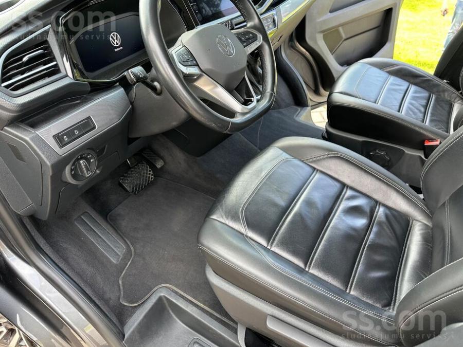 Grey Volkswagen Multivan 2023 in Riga, with an engine capacity of 2.00 L and mileage of 93 thousand km for 44900 €, photo 10 on AUTOMOTO.COM.LV