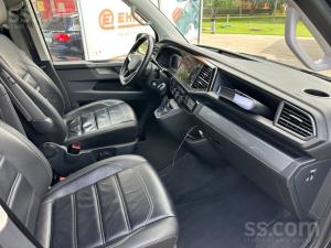 Grey Volkswagen Multivan 2023 in Riga, with an engine capacity of 2.00 L and mileage of 93 thousand km for 44900 €, photo 14 on AUTOMOTO.COM.LV