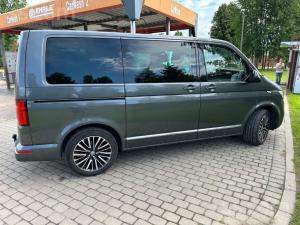Grey Volkswagen Multivan 2023 in Riga, with an engine capacity of 2.00 L and mileage of 93 thousand km for 44900 €, photo 15 on AUTOMOTO.COM.LV