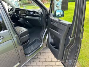 Grey Volkswagen Multivan 2023 in Riga, with an engine capacity of 2.00 L and mileage of 93 thousand km for 44900 €, photo 17 on AUTOMOTO.COM.LV