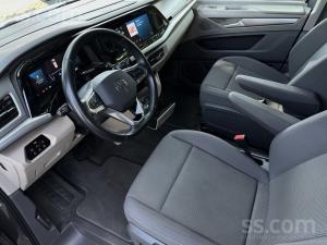 Grey Volkswagen Multivan 2023 in Riga, with an engine capacity of 2.00 L and mileage of 118 thousand km for 39950 €, photo 8 on AUTOMOTO.COM.LV