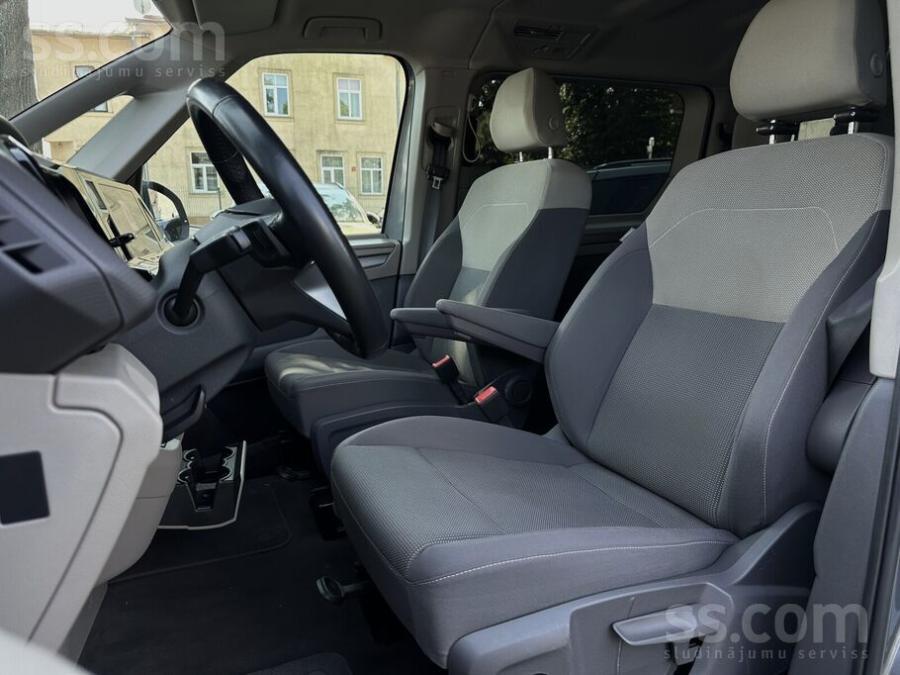 Grey Volkswagen Multivan 2023 in Riga, with an engine capacity of 2.00 L and mileage of 118 thousand km for 39950 €, photo 9 on AUTOMOTO.COM.LV
