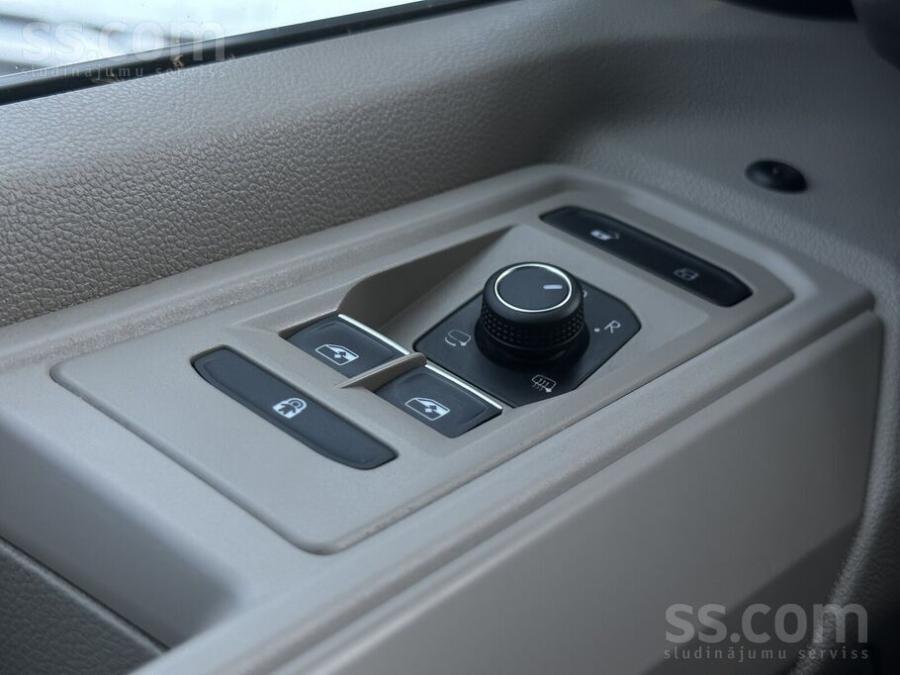 Grey Volkswagen Multivan 2023 in Riga, with an engine capacity of 2.00 L and mileage of 118 thousand km for 39950 €, photo 12 on AUTOMOTO.COM.LV