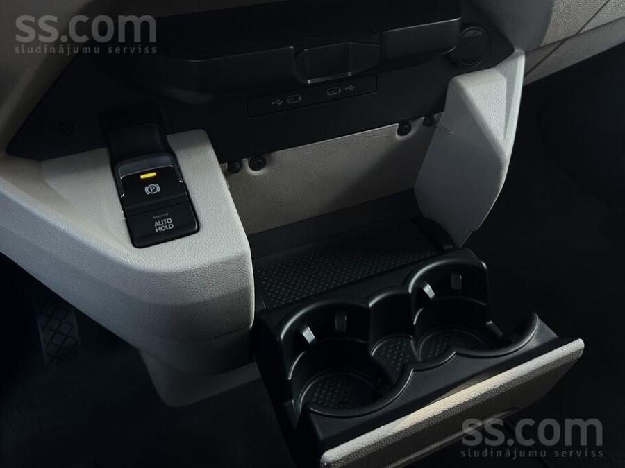Grey Volkswagen Multivan 2023 in Riga, with an engine capacity of 2.00 L and mileage of 118 thousand km for 39950 €, photo 18 on AUTOMOTO.COM.LV