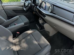 Grey Volkswagen Multivan 2023 in Riga, with an engine capacity of 2.00 L and mileage of 118 thousand km for 39950 €, photo 20 on AUTOMOTO.COM.LV
