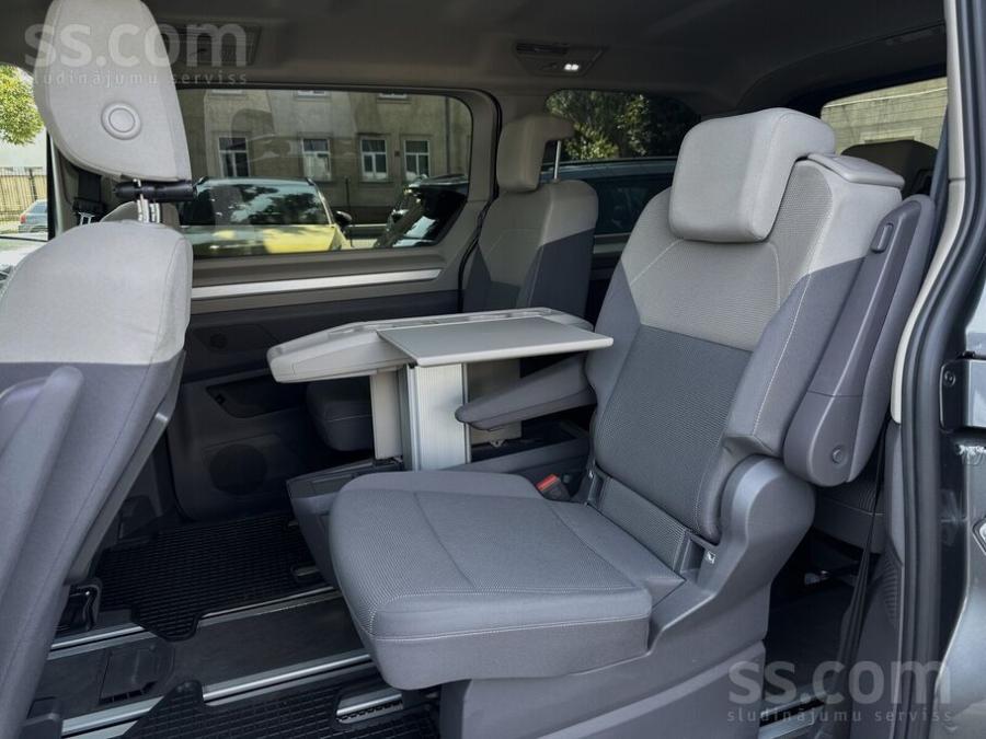 Grey Volkswagen Multivan 2023 in Riga, with an engine capacity of 2.00 L and mileage of 118 thousand km for 39950 €, photo 23 on AUTOMOTO.COM.LV