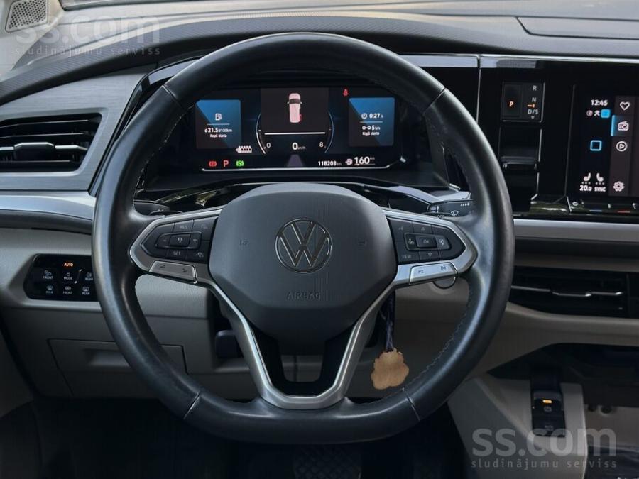 Grey Volkswagen Multivan 2023 in Riga, with an engine capacity of 2.00 L and mileage of 118 thousand km for 39950 €, photo 27 on AUTOMOTO.COM.LV