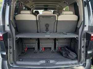 Grey Volkswagen Multivan 2023 in Riga, with an engine capacity of 2.00 L and mileage of 118 thousand km for 39950 €, photo 28 on AUTOMOTO.COM.LV