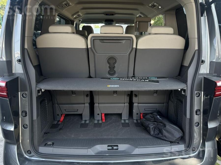 Grey Volkswagen Multivan 2023 in Riga, with an engine capacity of 2.00 L and mileage of 118 thousand km for 39950 €, photo 28 on AUTOMOTO.COM.LV
