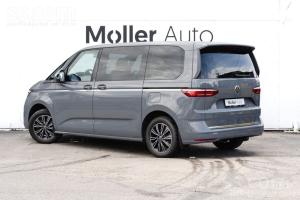 Grey Volkswagen Multivan 2023 in Riga, with an engine capacity of 1.40 L and mileage of 92 thousand km for 44950 €, photo 4 on AUTOMOTO.COM.LV