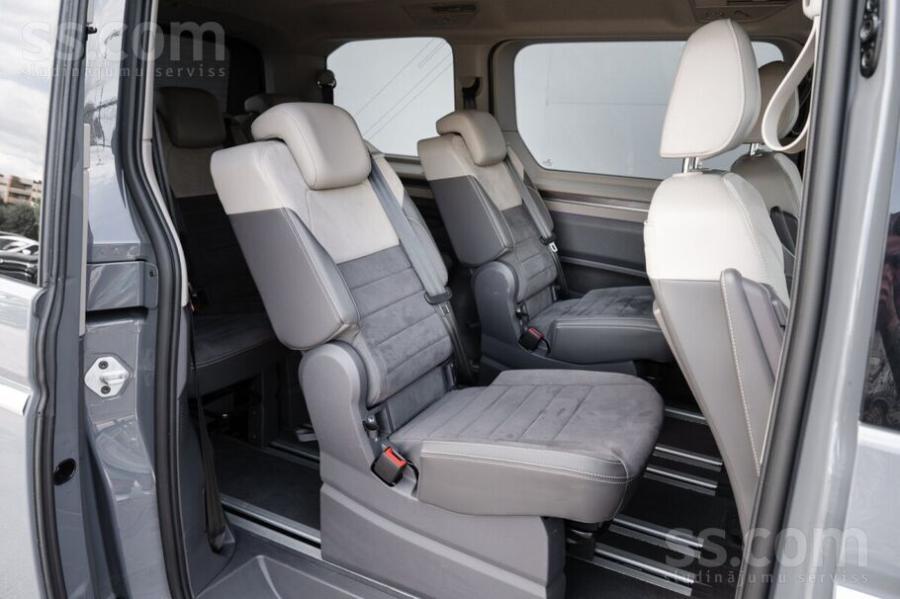 Grey Volkswagen Multivan 2023 in Riga, with an engine capacity of 1.40 L and mileage of 92 thousand km for 44950 €, photo 9 on AUTOMOTO.COM.LV