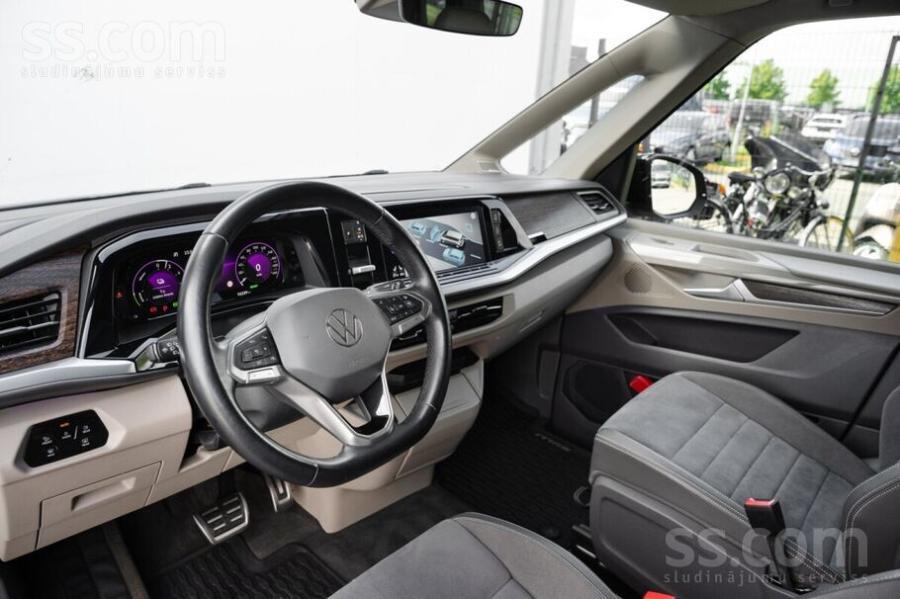 Grey Volkswagen Multivan 2023 in Riga, with an engine capacity of 1.40 L and mileage of 92 thousand km for 44950 €, photo 32 on AUTOMOTO.COM.LV