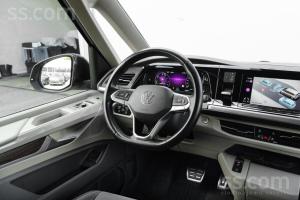 Grey Volkswagen Multivan 2023 in Riga, with an engine capacity of 1.40 L and mileage of 92 thousand km for 44950 €, photo 34 on AUTOMOTO.COM.LV