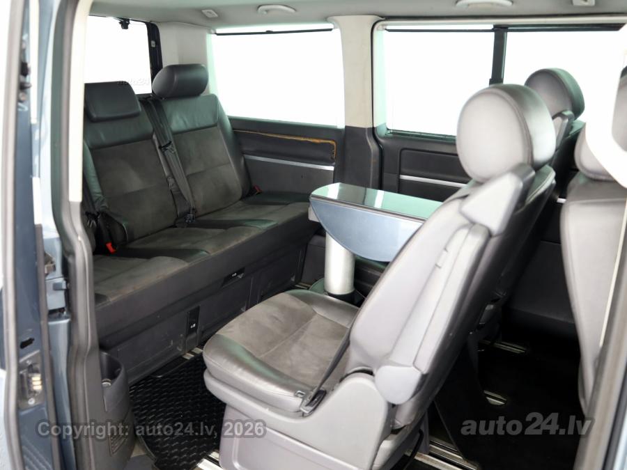 Grey Volkswagen Multivan 2007 in Tallinn, with an engine capacity of 2.50 L and mileage of 384 thousand km for 3199 €, photo 8 on AUTOMOTO.COM.LV