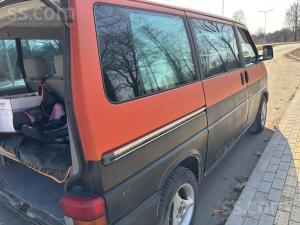 Orange Volkswagen Multivan 1996 in Riga, with an engine capacity of 2.50 L and mileage of 552 thousand km for 2900 €, photo 13 on AUTOMOTO.COM.LV