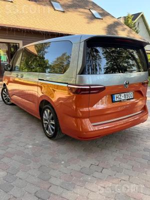 Orange Volkswagen Multivan 2022 in Riga, with an engine capacity of 1.40 L and mileage of 152 thousand km for 42500 €, photo 3 on AUTOMOTO.COM.LV